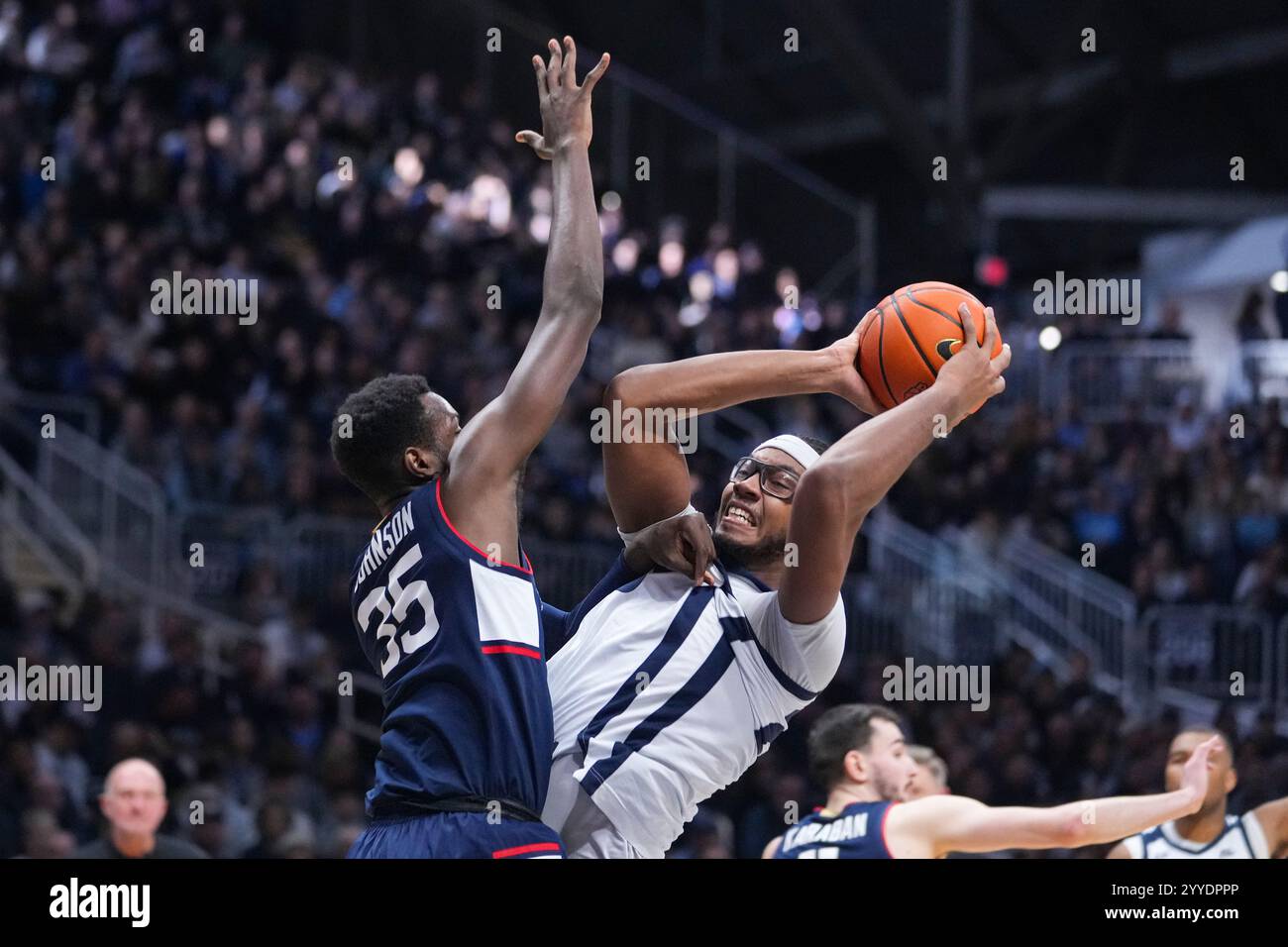 Butler center Andre Screen (23) shoots over Connecticut center Samson ...