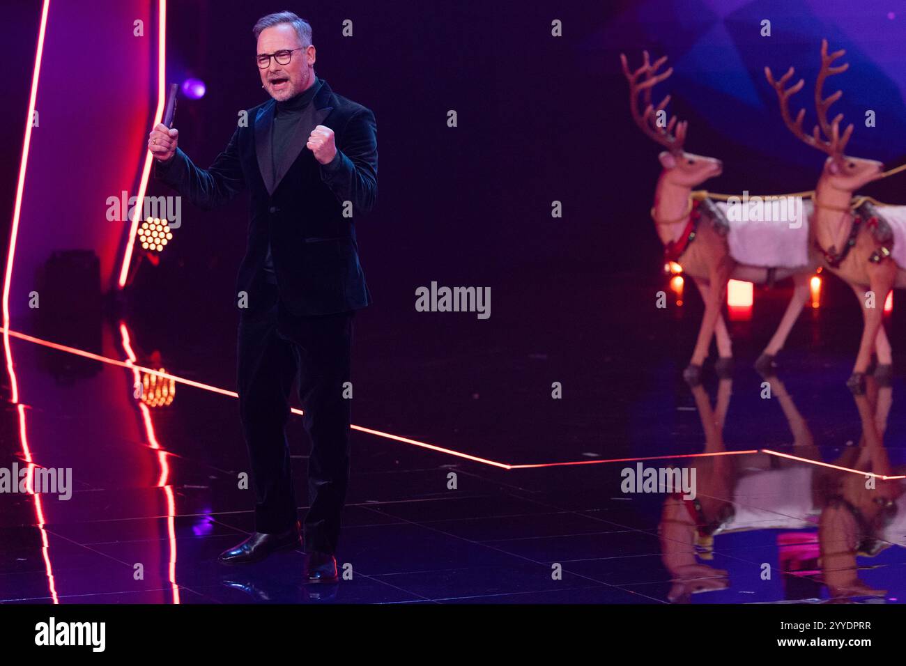 Cologne, Germany. 21st Dec, 2024. Presenter Matthias Opdenhövel is on ...