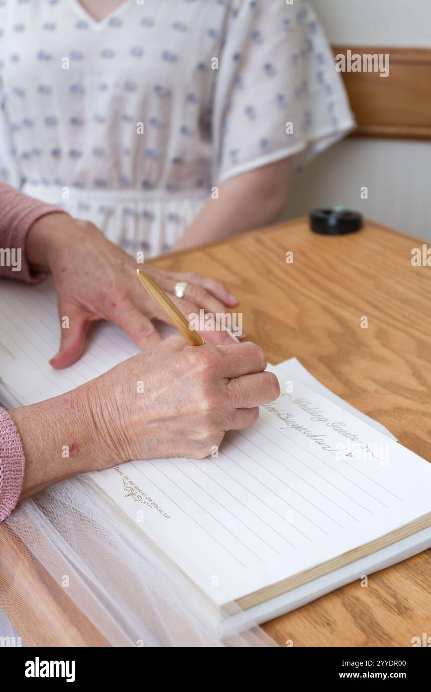 Hands of a lady writing hi-res stock photography and images - Alamy