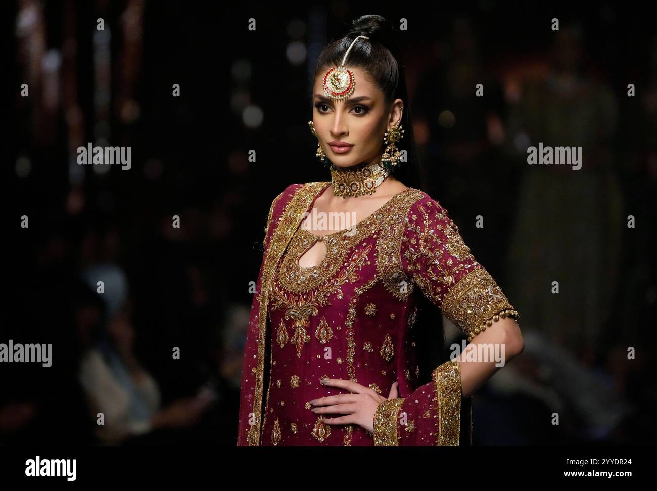 A model presents a creation from designer Harris Shakeel during a ...