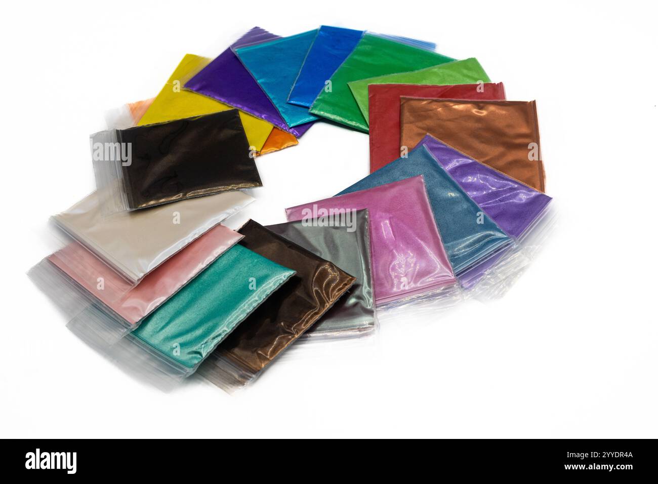 Colored cosmetic mica powder bags. Mica powder samples Stock Photo - Alamy