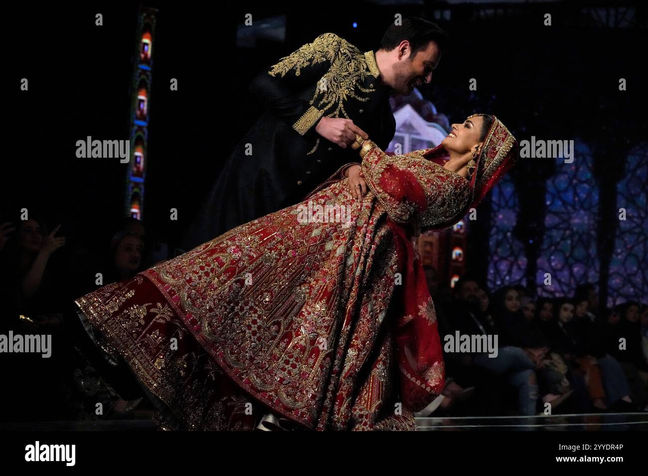 Models present a creation from designer Basit Sipra during a fashion ...