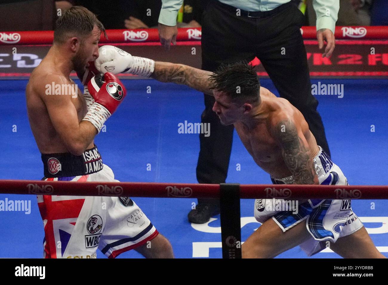 Boxers Isaac Lowe, left, and Lee McGregor compete during their WBC ...