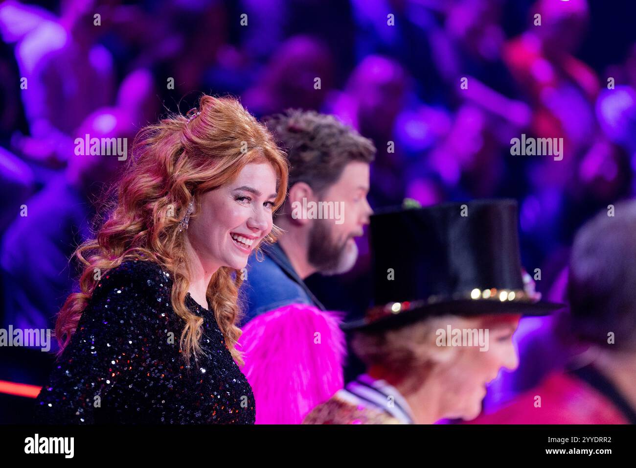 Cologne, Germany. 21st Dec, 2024. Rea Garvey (back) and Palina Rojinski ...