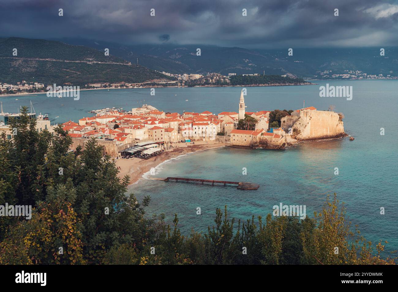 The historic town of Budva, with its ancient stone buildings and blue ...