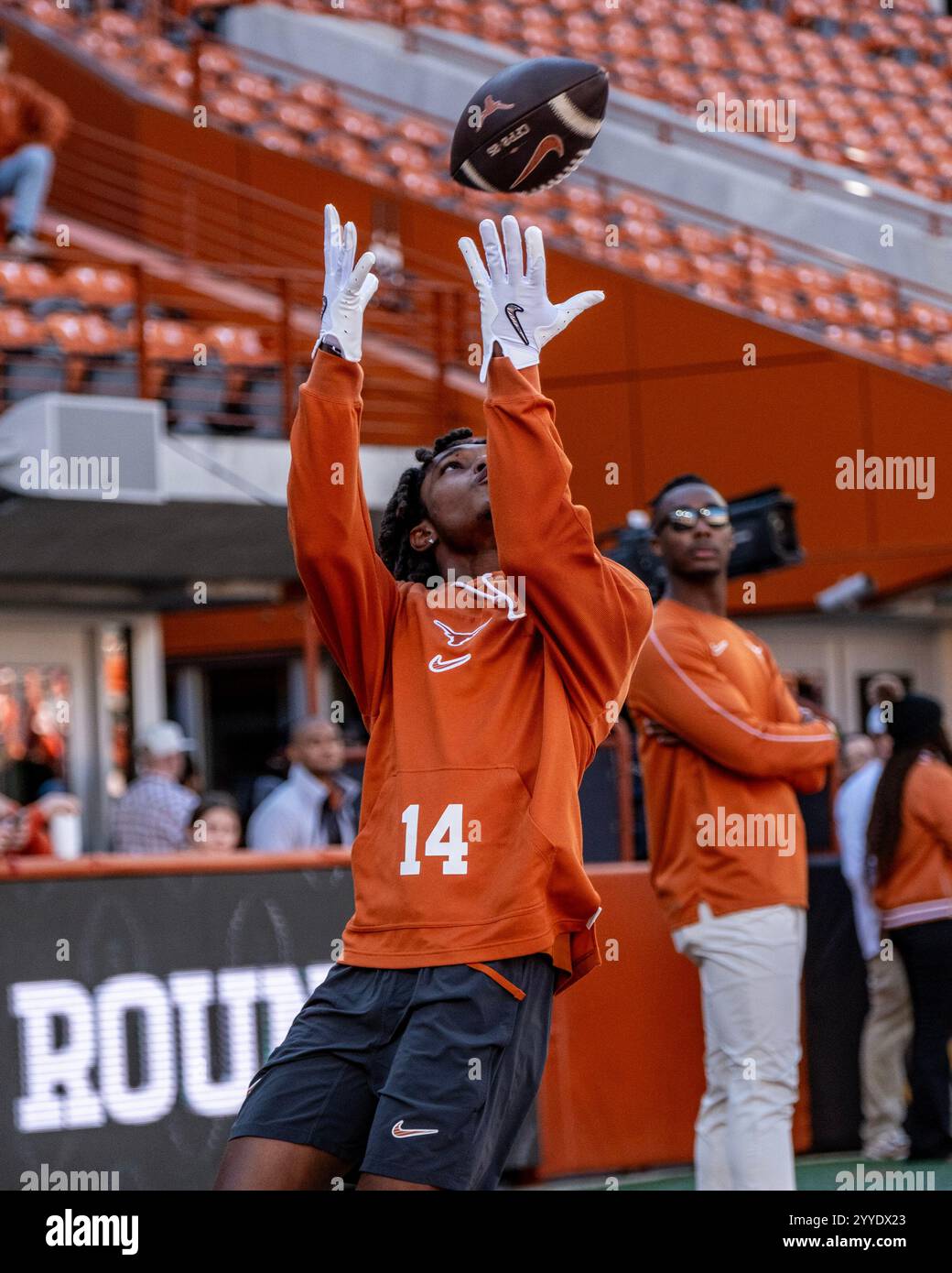 Dec 21, 2024.Aaron Butler #14 of the Texas Longhorns during warmups ...