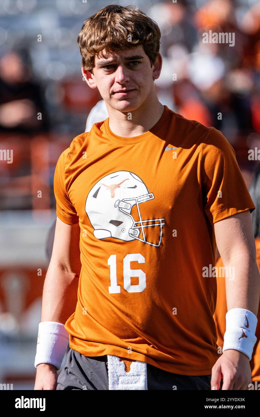 Dec 21, 2024.Arch Manning #16 of the Texas Longhorns during warmups ...