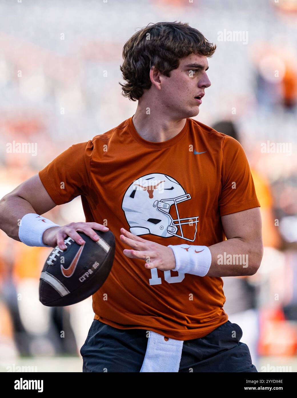 Dec 21, 2024.Arch Manning #16 of the Texas Longhorns during warmups ...