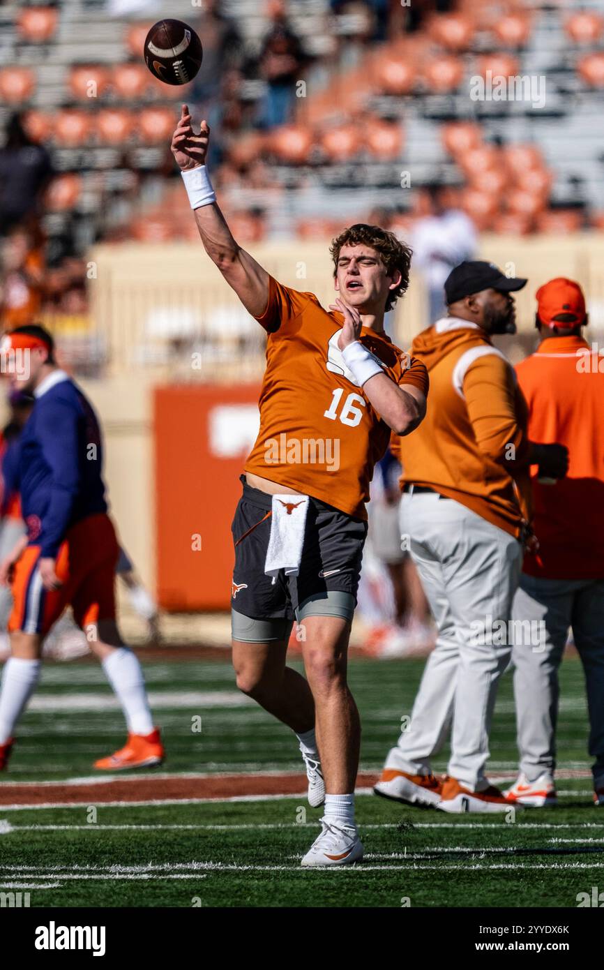 Dec 21, 2024.Arch Manning #16 of the Texas Longhorns during warmups ...