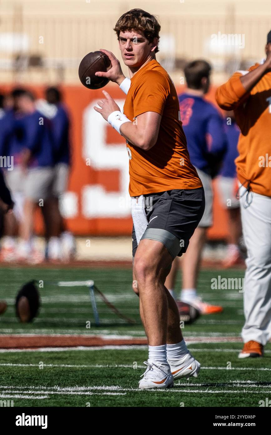 Dec 21, 2024.Arch Manning #16 of the Texas Longhorns during warmups ...