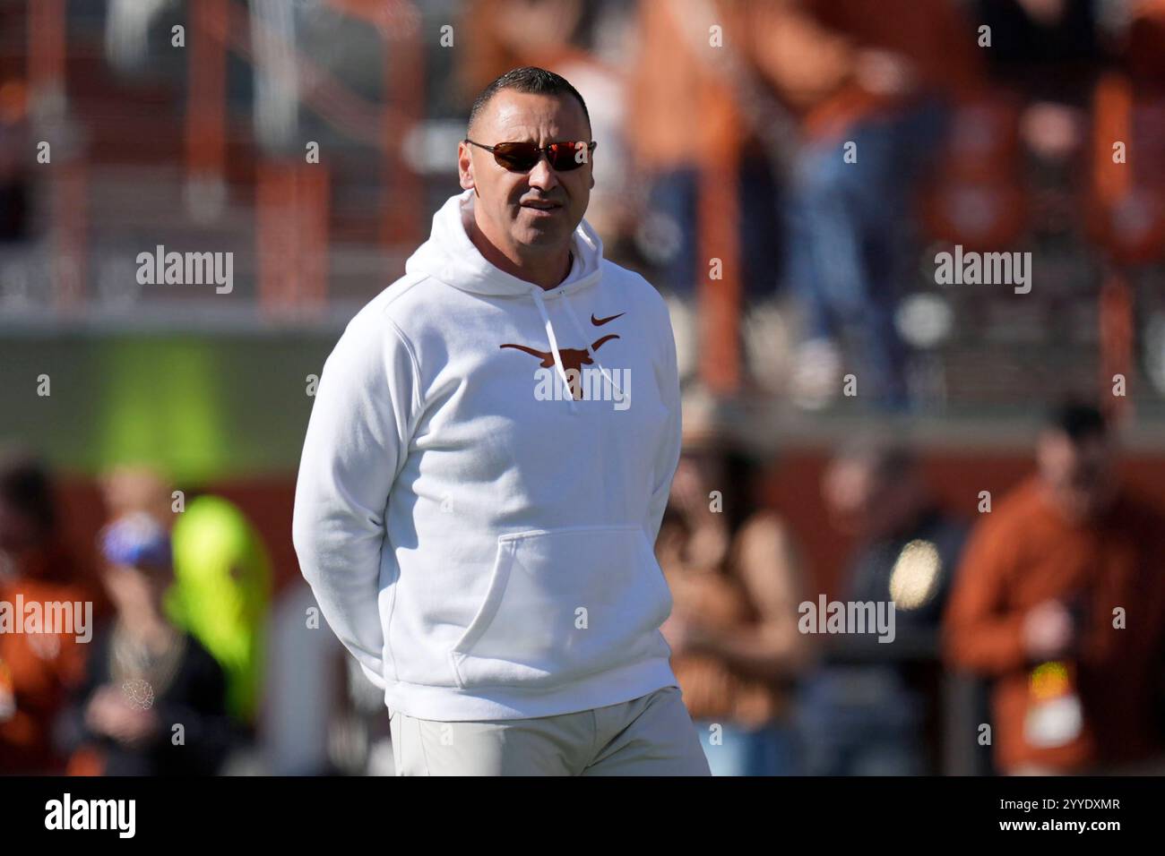 Texas head coach Steve Sarkisian watches his team warmup before a first ...