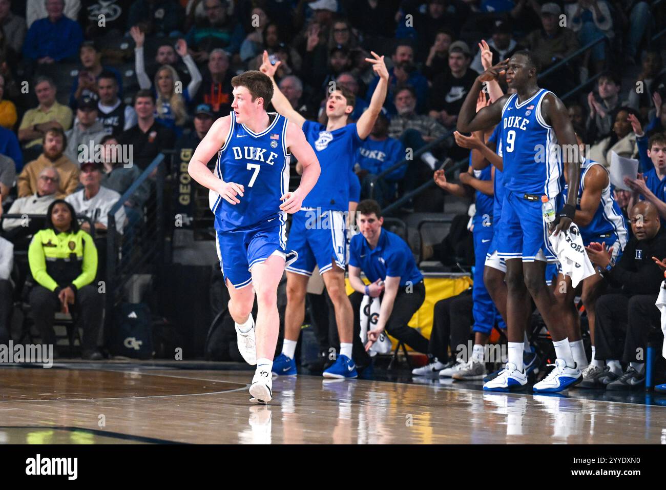 ATLANTA, GA – DECEMBER 21: The Duke bench reacts to a three-pointer by ...