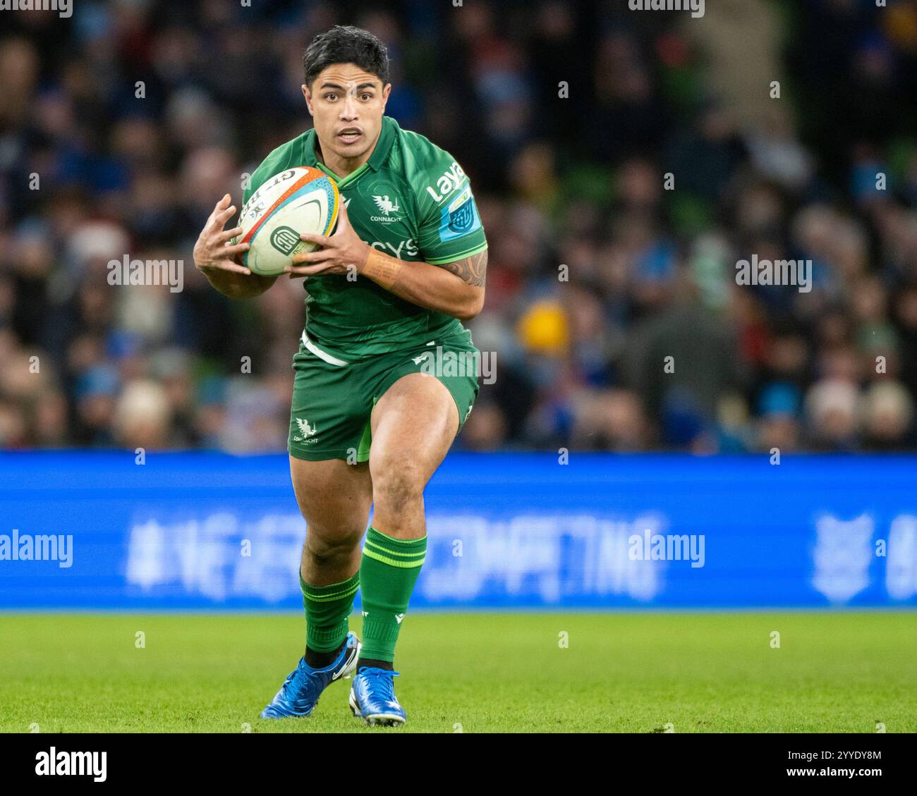 Dublin, Ireland. 21st Dec, 2024. Josh Ioane of Connacht runs with the ...