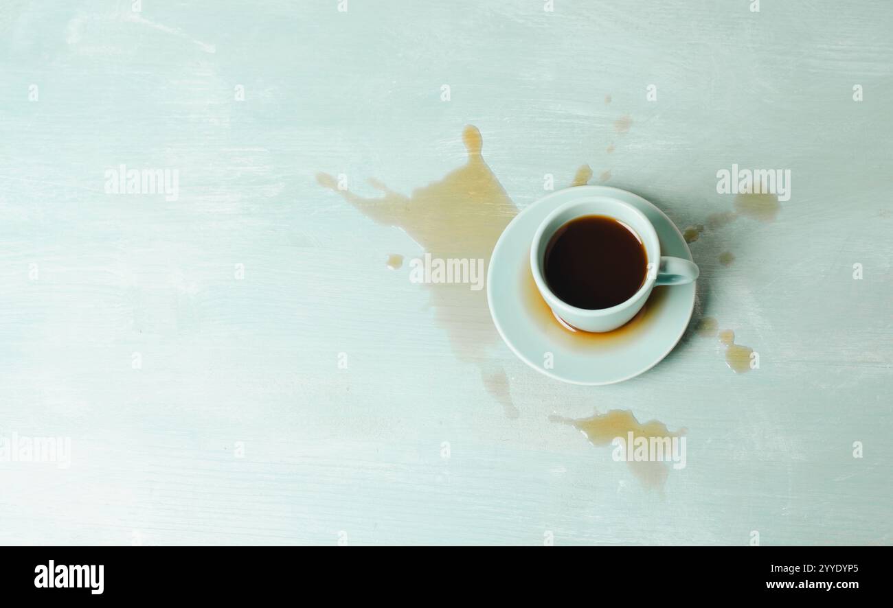 Cup of coffee with spilled drink, wake up in the morning, caffeine ...