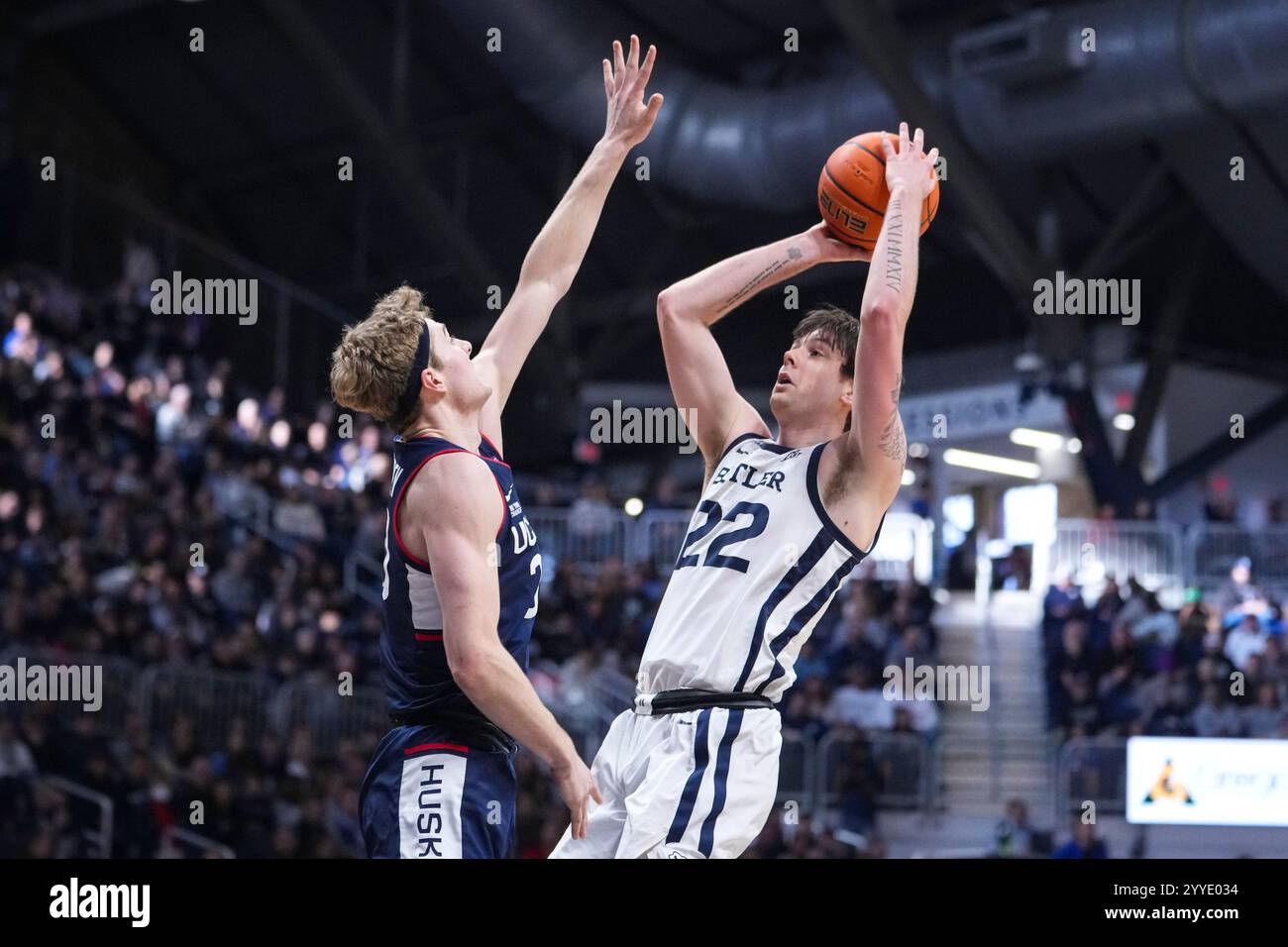 Butler forward Patrick McCaffery (22) shoots over Connecticut forward ...