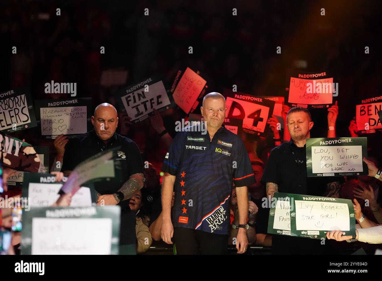 Raymond van Barneveld walks out to play Nick Kenny (not pictured) in ...
