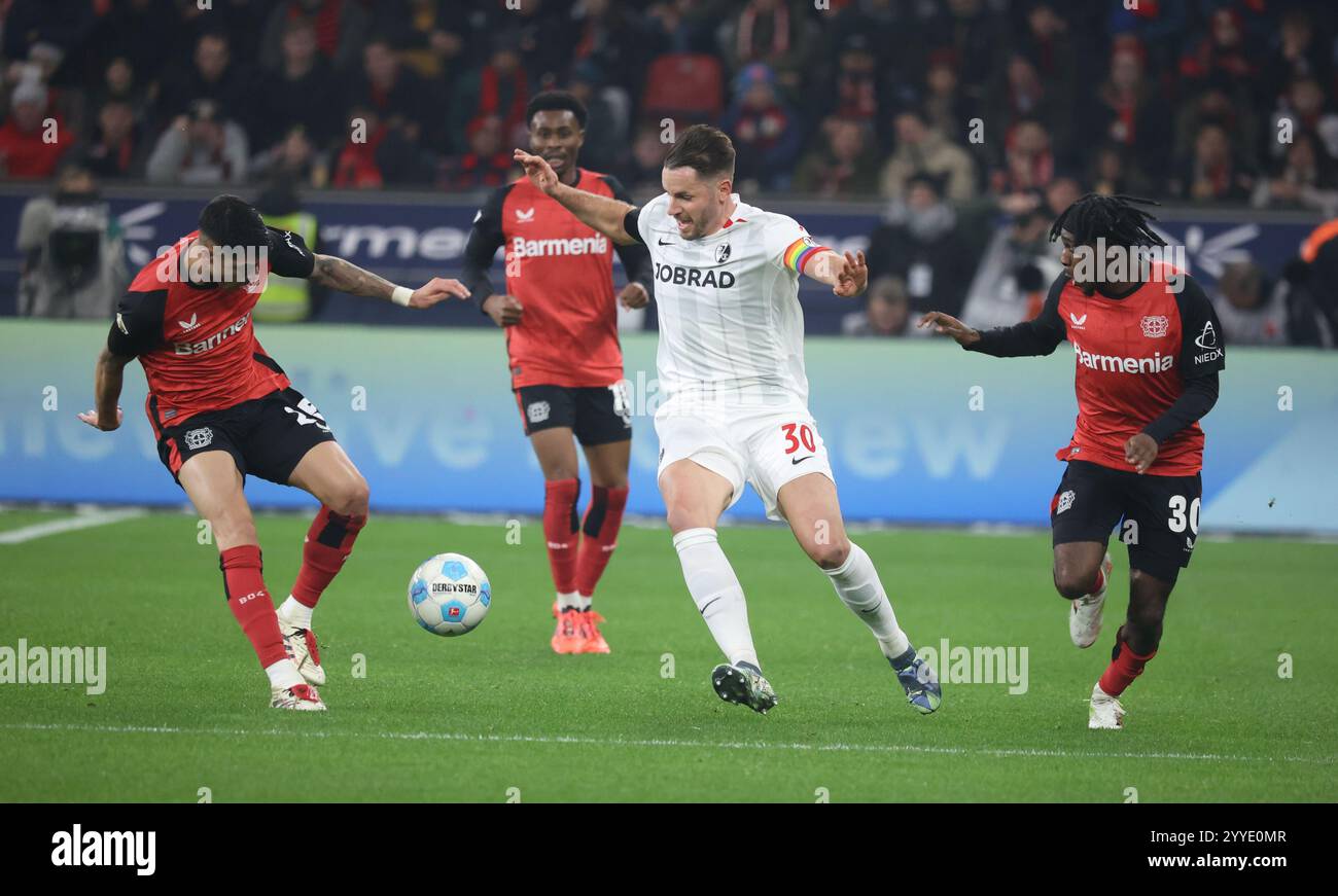 From left: Exequiel Alejandro Palacios (Bayer), Christian Guenter (Freiburg), Jeremie Frimpong ...