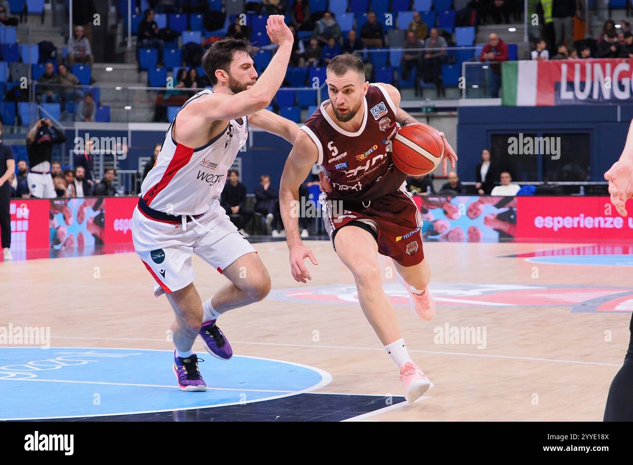 Milan, Italy. 21st Dec, 2024. Lazar Nikolic (HDL Nardo basket) & Luca ...