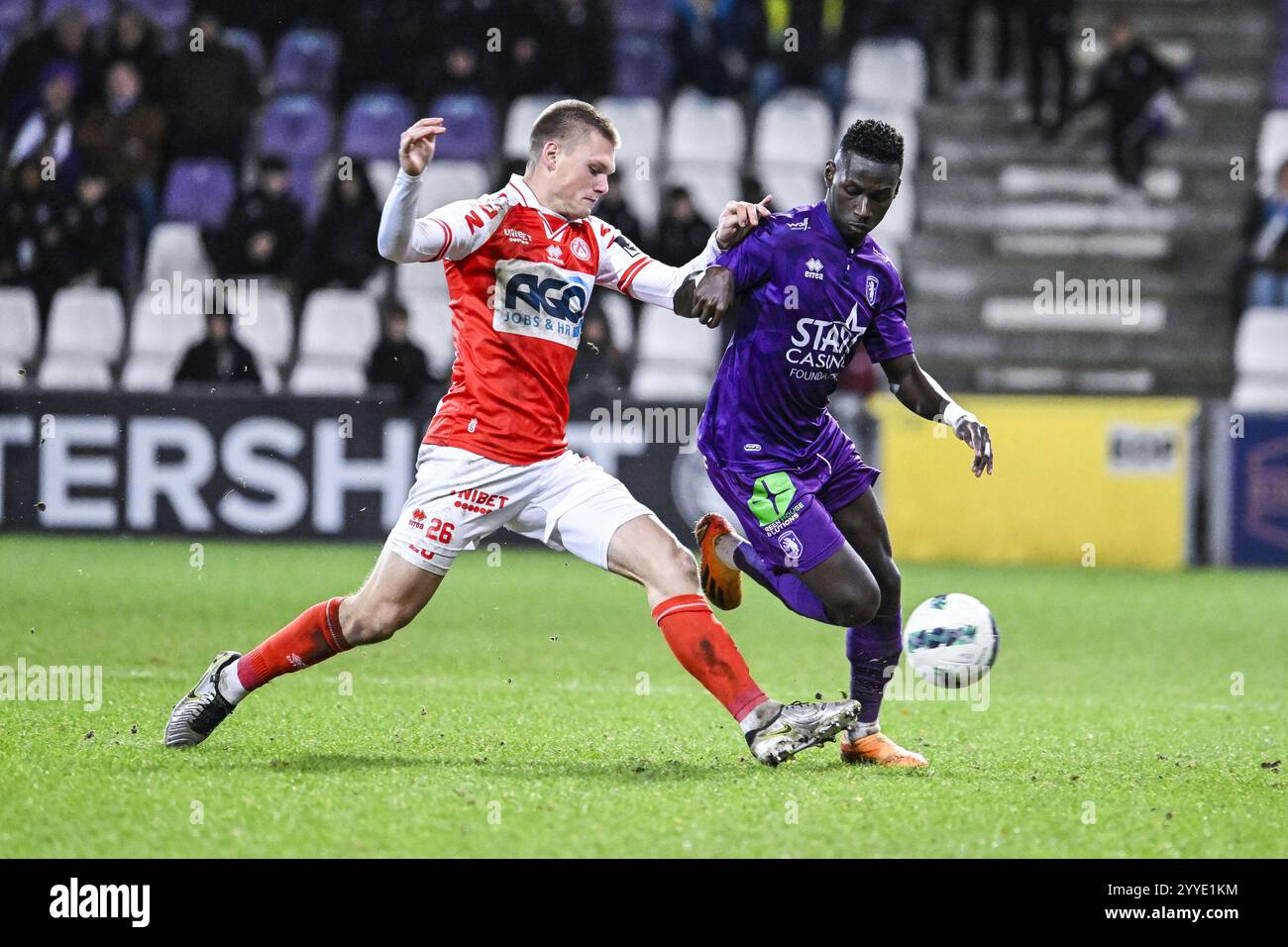 Antwerp, Belgium. 21st Dec, 2024. Kortrijk's Bram Lagae and Beerschot's ...
