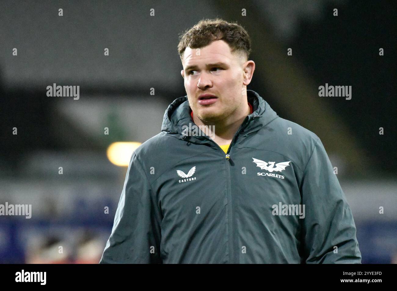 Swansea, Wales. 21 December 2024. Alex Craig of Scarlets warming up ...