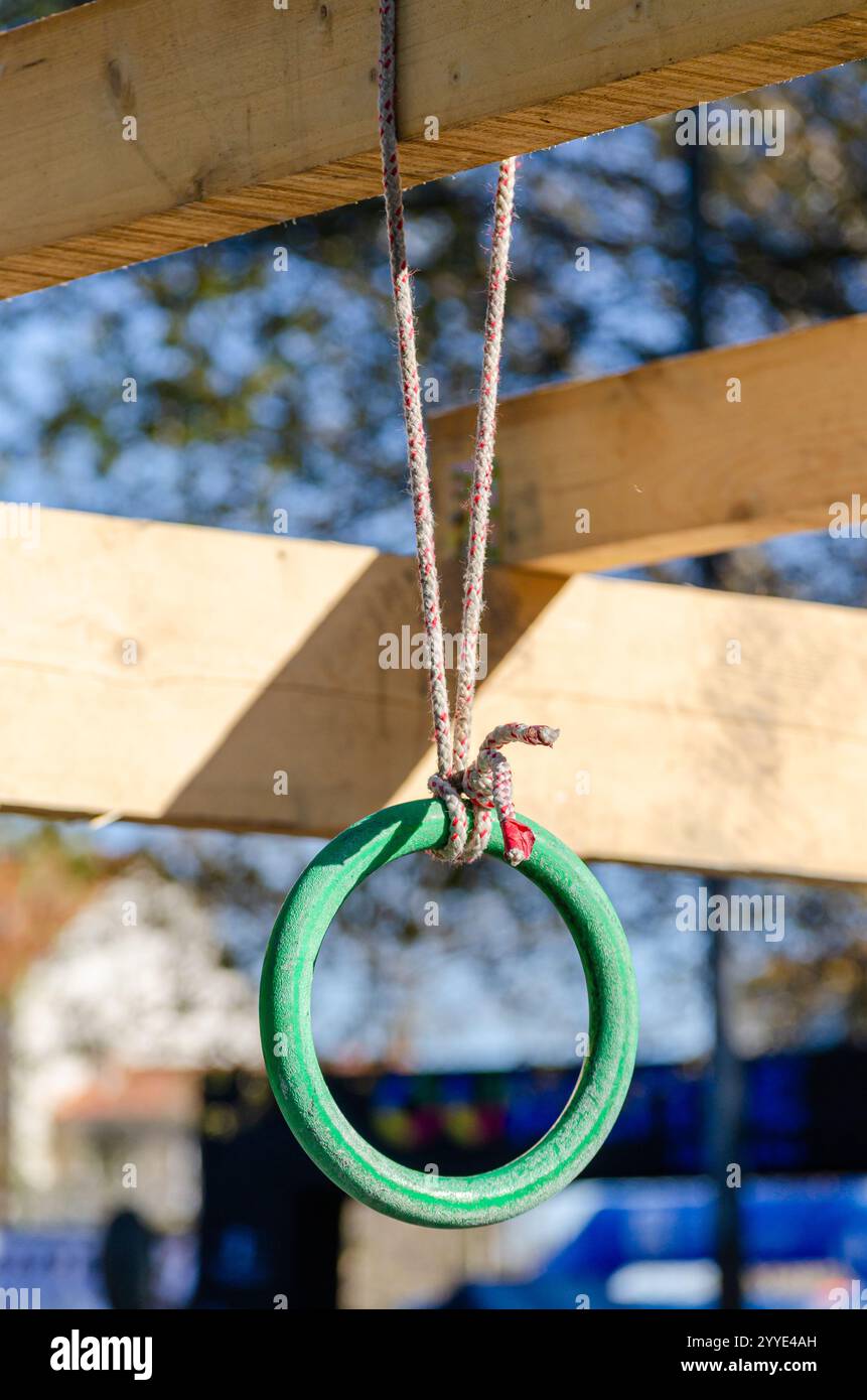 rings hanging on one of the obstacles of an OCR race Stock Photo - Alamy
