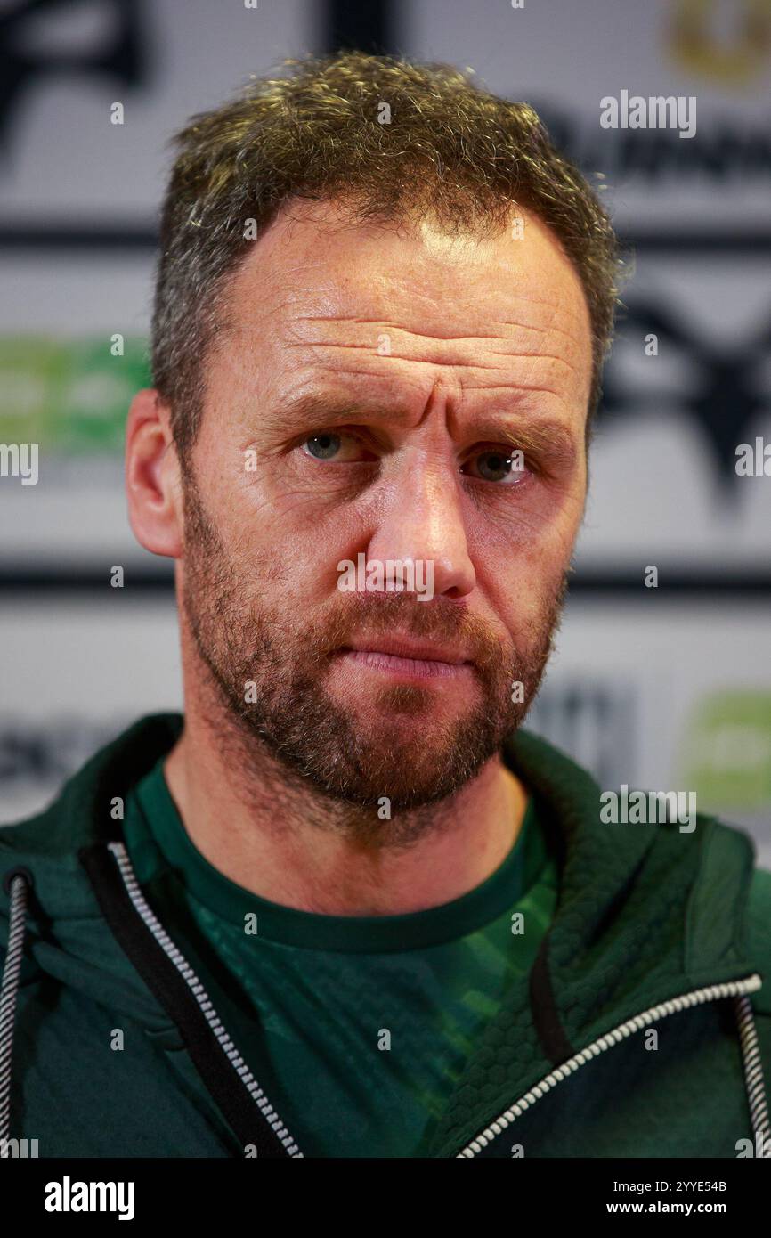 Swansea, UK. 21 December, 2024. Ospreys head coach Mark Jones during a ...