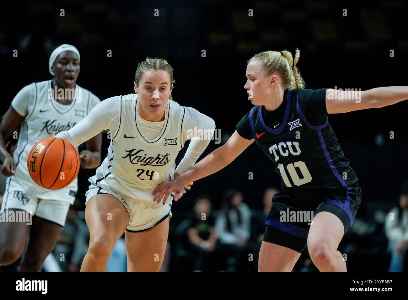 ORLANDO, FL - DECEMBER 21: UCF Knights guard Ally Stedman (24) dribbles ...