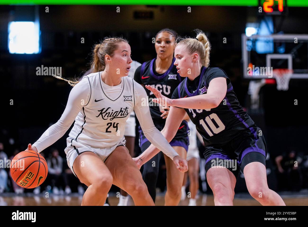 ORLANDO, FL - DECEMBER 21: UCF Knights guard Ally Stedman (24) dribbles ...