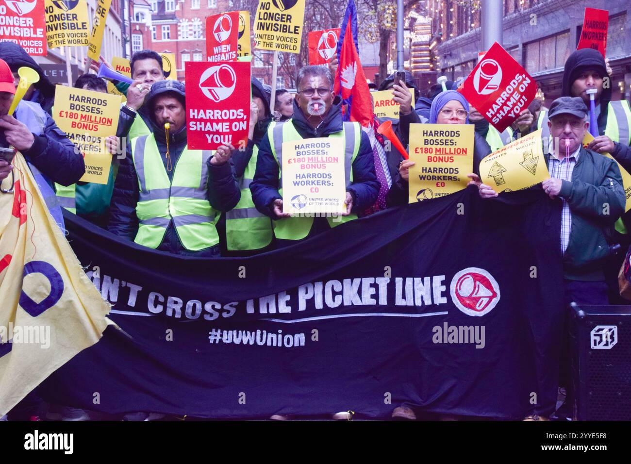 London, UK. 21st December 2024. Harrods workers stage a protest at the ...