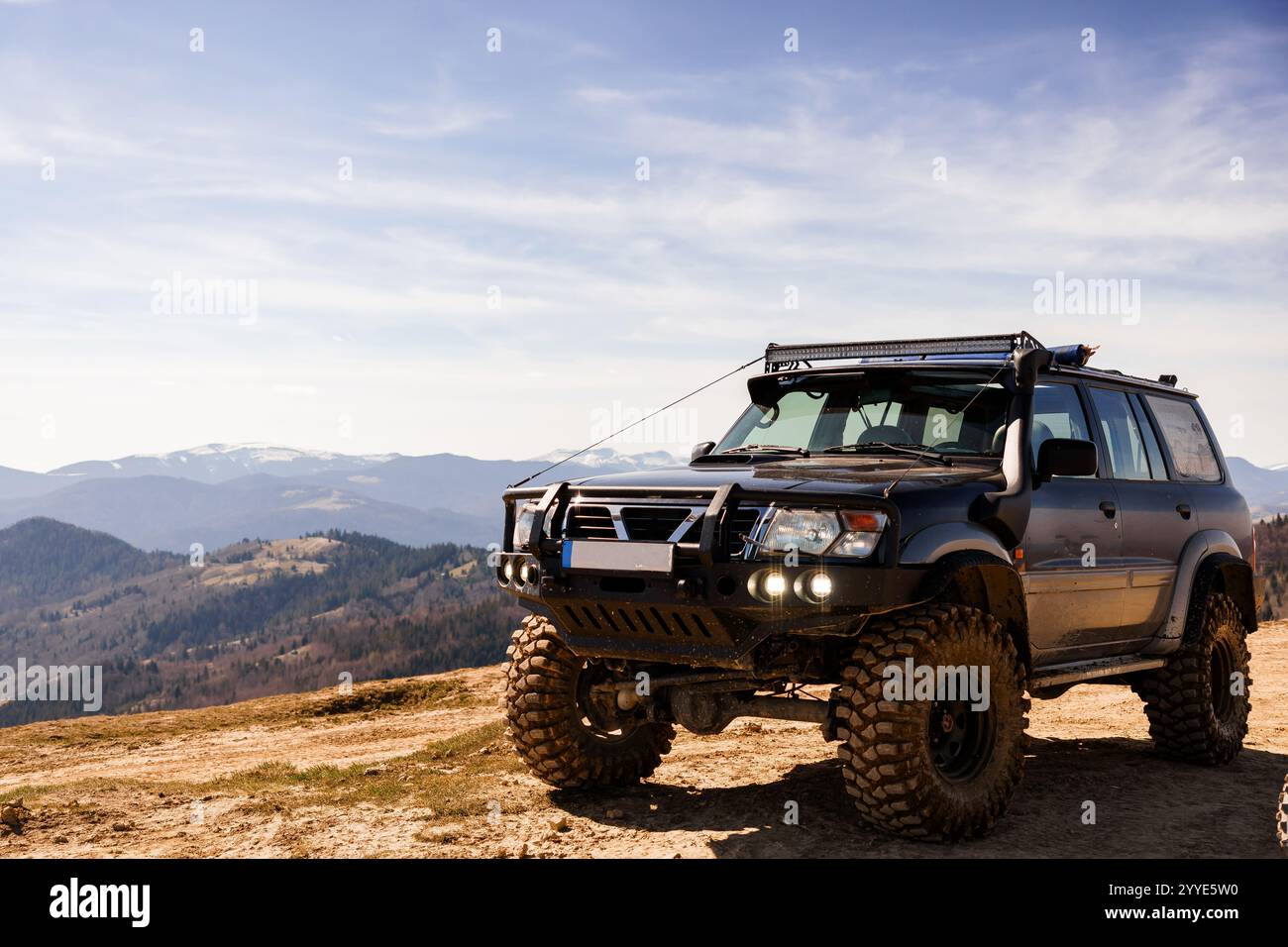 Off-Road Adventure: Rugged SUV on Mountain Terrain Stock Photo - Alamy