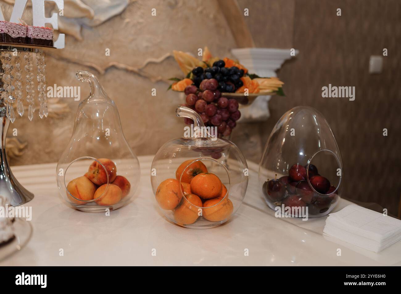 Elegant Fruit Display in Glass Containers at a Festive Event Stock ...