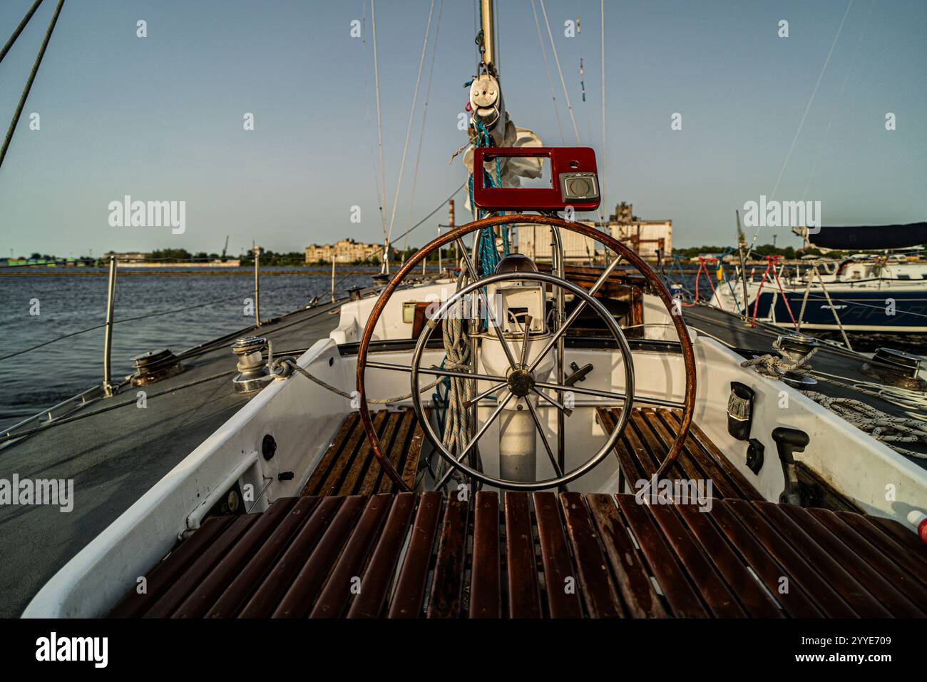 Sailboat Cockpit with Steering Wheel Stock Photo - Alamy