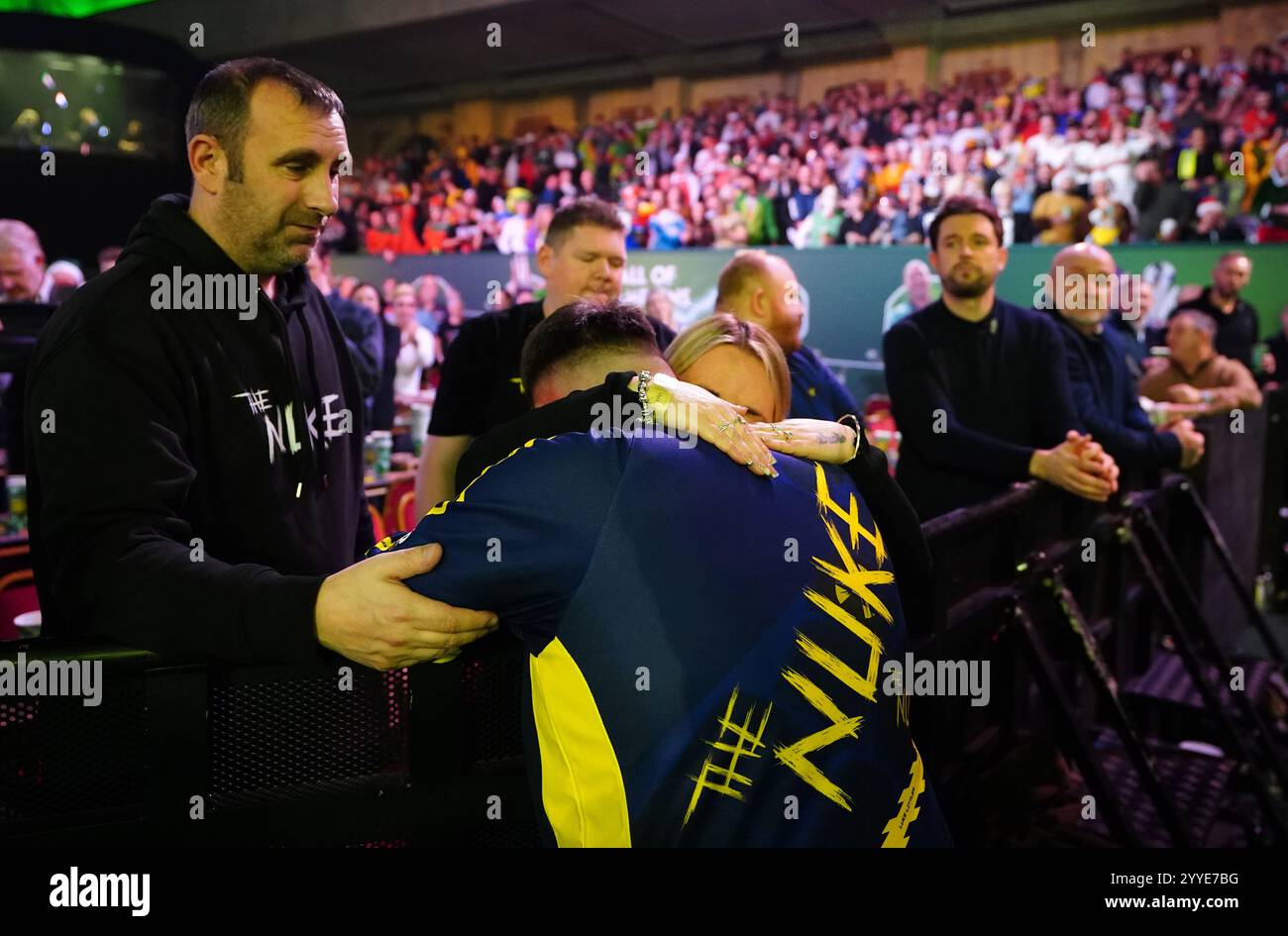 Luke Littler with his family following his victory over Ryan Meikle on ...