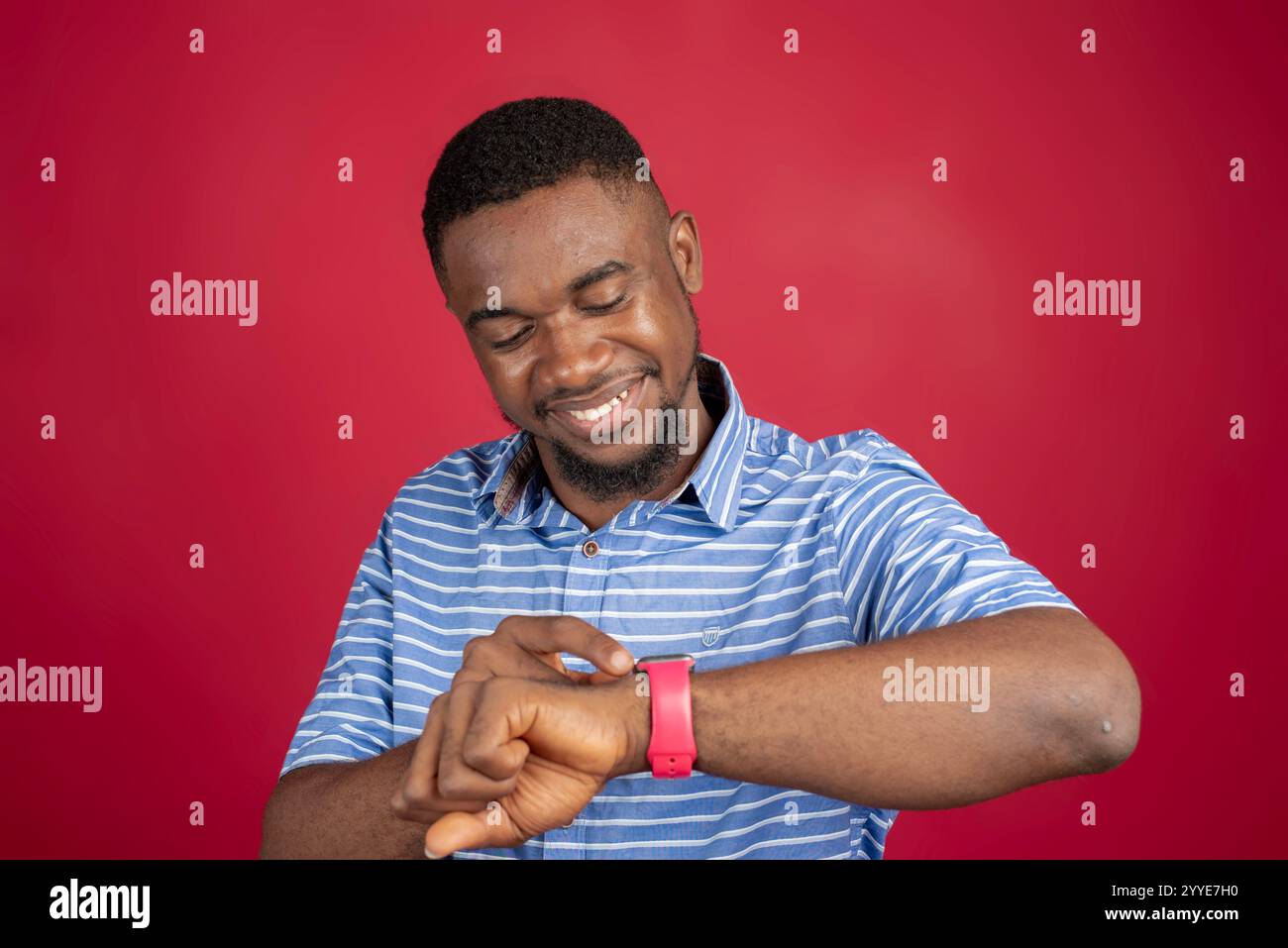 Young businessman pointing wrist hi-res stock photography and images ...