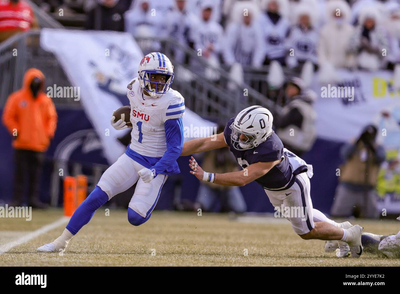 State College, Pennsylvania, USA. 21st Dec, 2024. Southern Methodist Mustangs running back ...