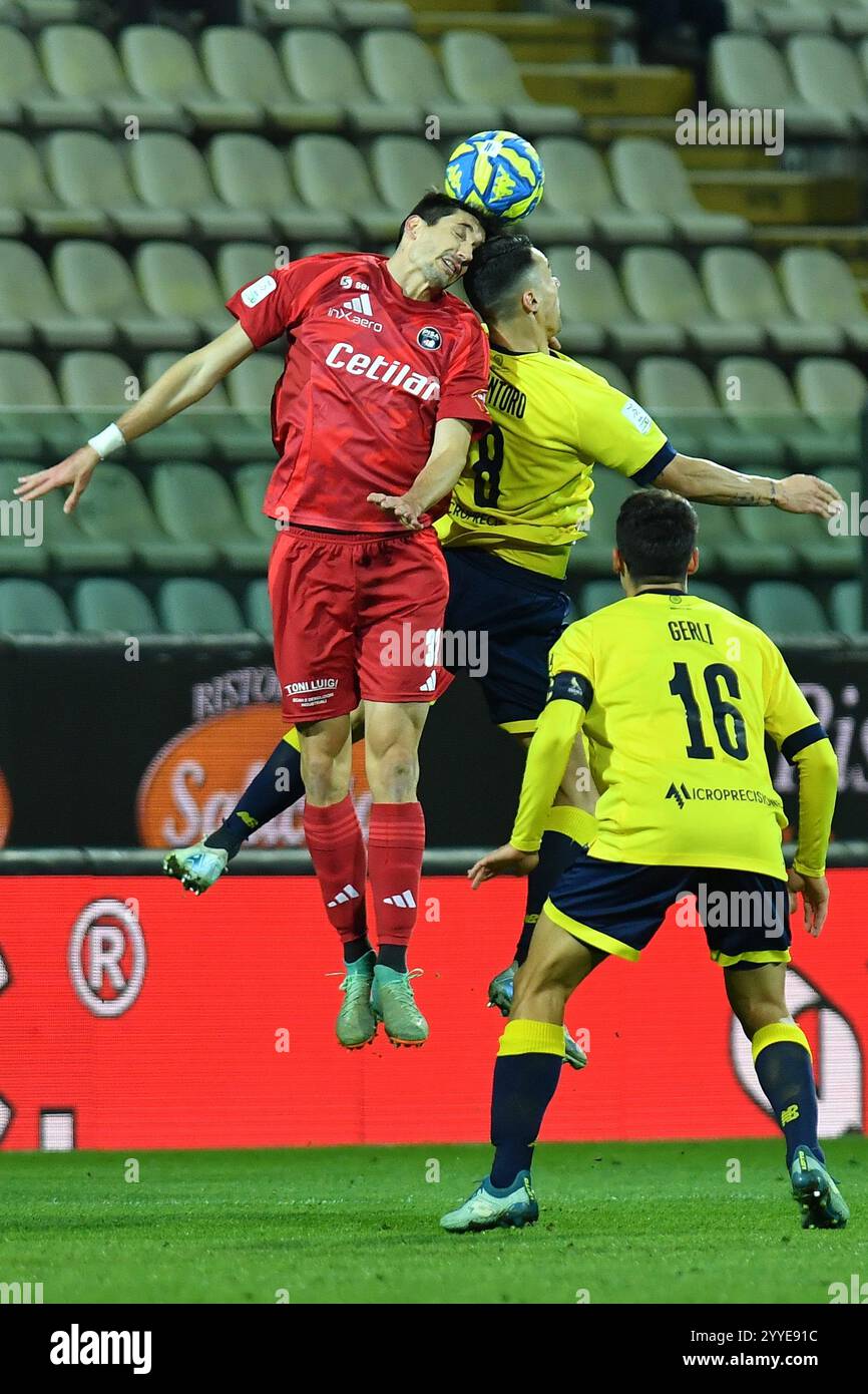 Modena, Italy. 21st Dec, 2024. Head tackle by Stefano Moreo (Pisa) and ...