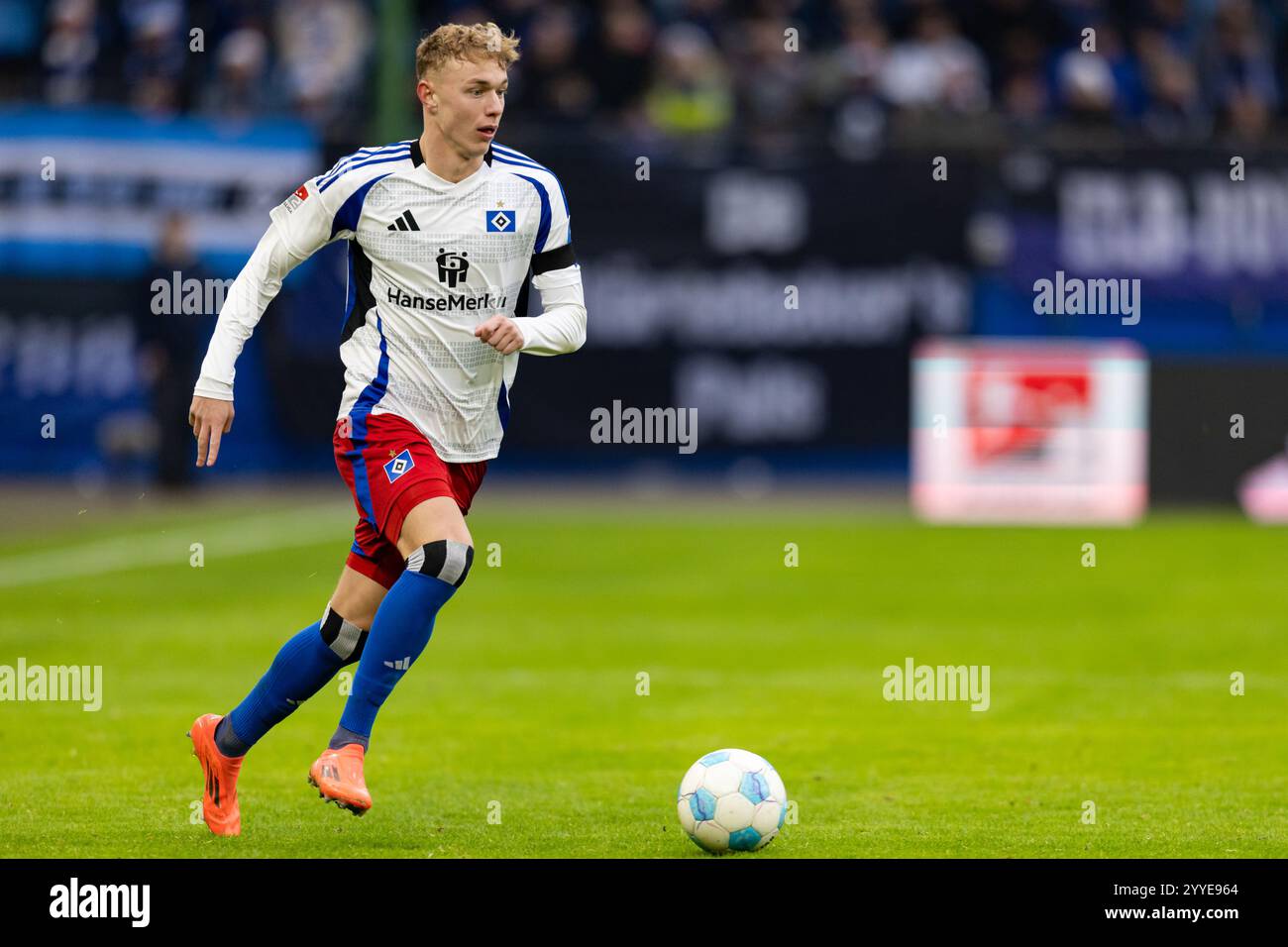 Hamburg, Germany. 21st Dec, 2024. Adam Karabec (17) of Hamburger SV ...