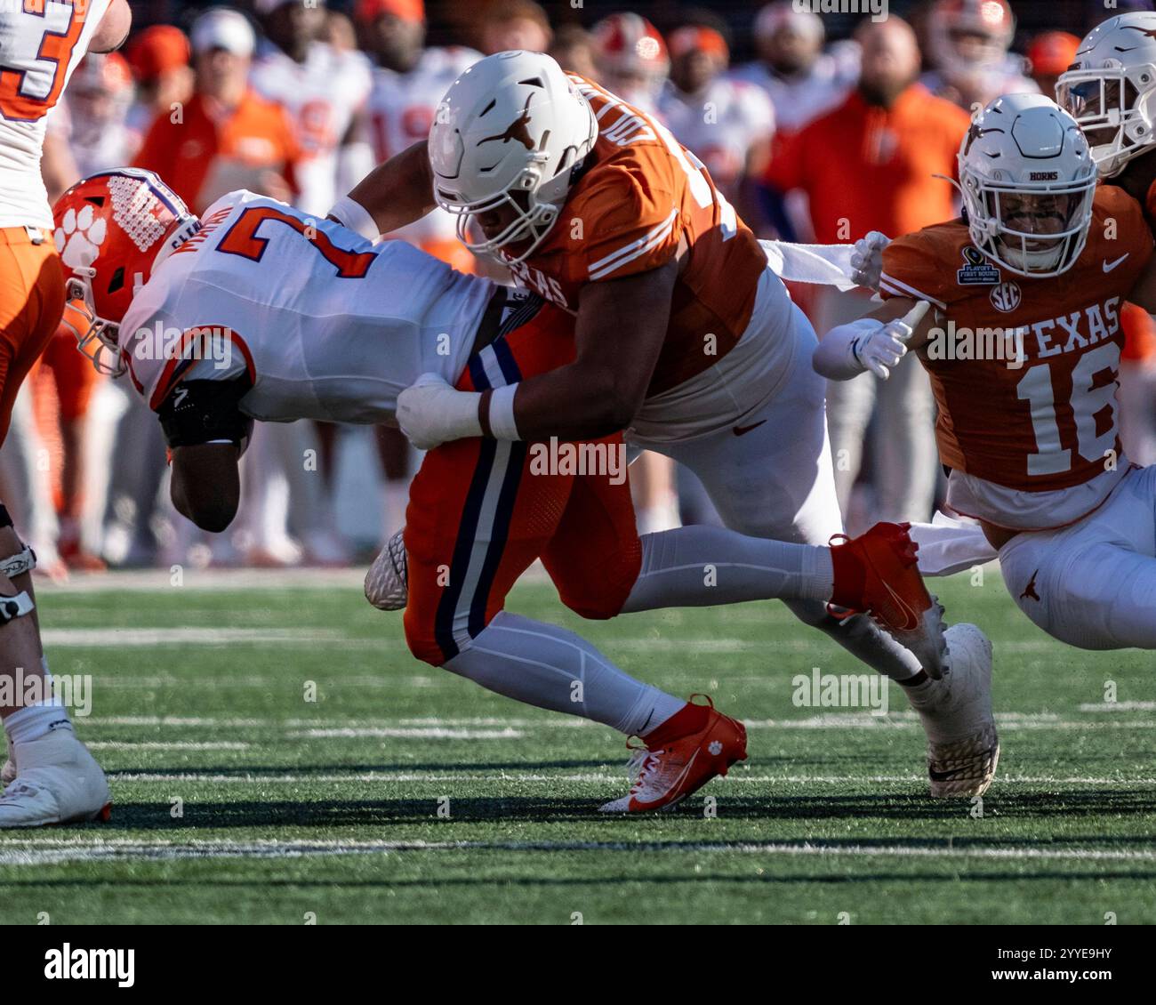 Dec 21, 2024. Alfred Collins #95 of the Texas Longhorns in action vs ...