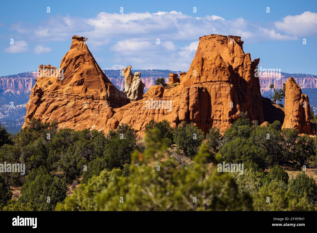 Monolithic stone spires of colorful sandstone dot the countryside at ...