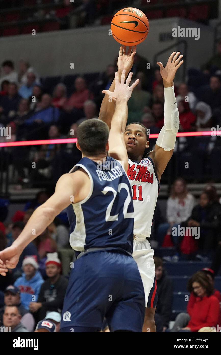 Mississippi guard Matthew Murrell (11) shoots past an attempted block ...