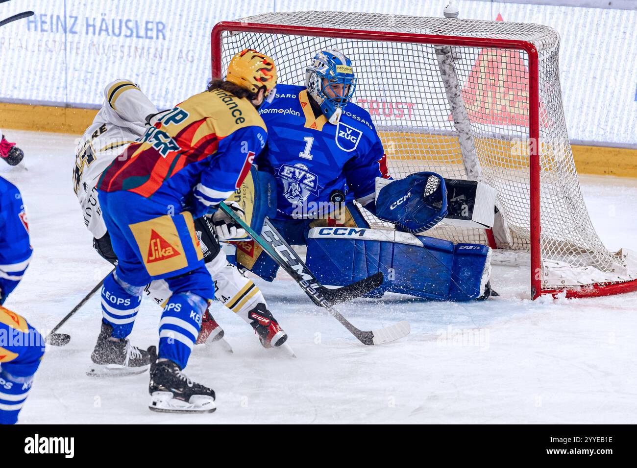 Goalkeeper Tim Wolf #1 (EV Zug) with a big save - 21.12.2024 - National ...
