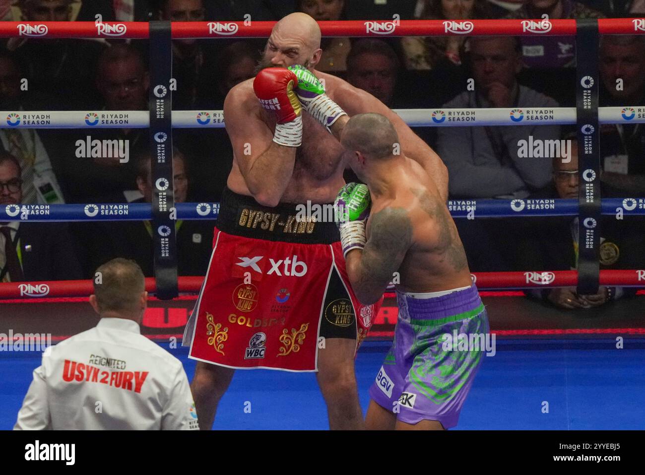Boxers Britain's Tyson Fury, left, and Ukraine's Oleksandr Usyk compete ...