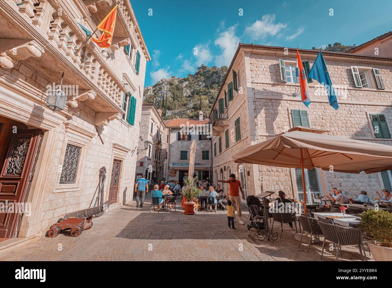 25 October 2024, Kotor, Montenegro: People enjoying a meal and drinks ...