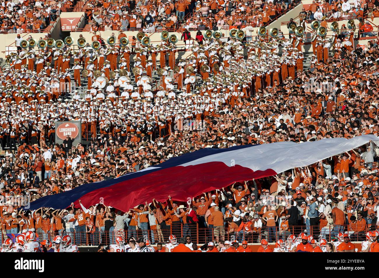 AUSTIN, TX - DECEMBER 21: Texas Longhorns students hold up a giant ...