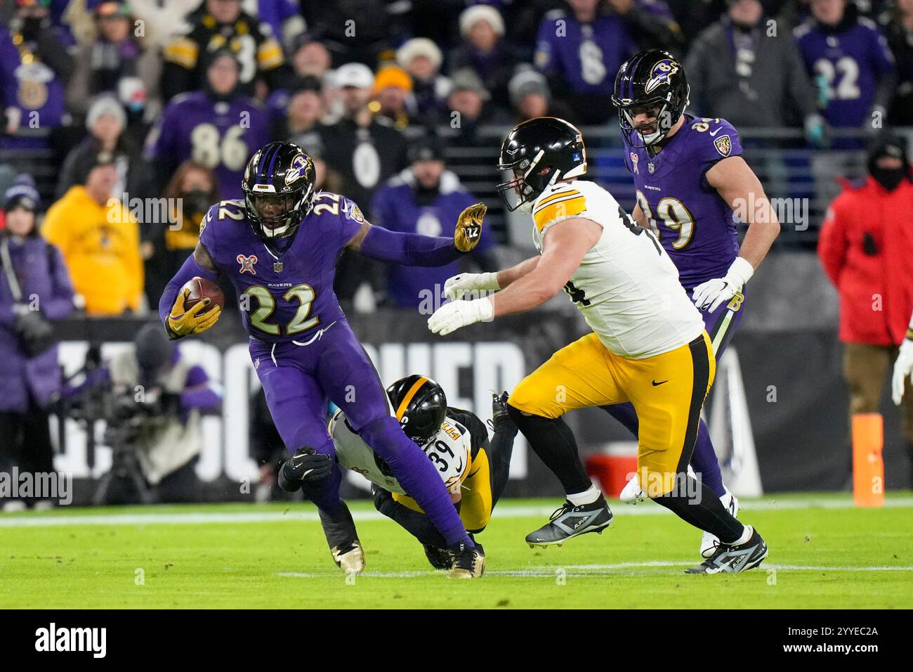 Baltimore Ravens running back Derrick Henry (22) runs with the ball as ...