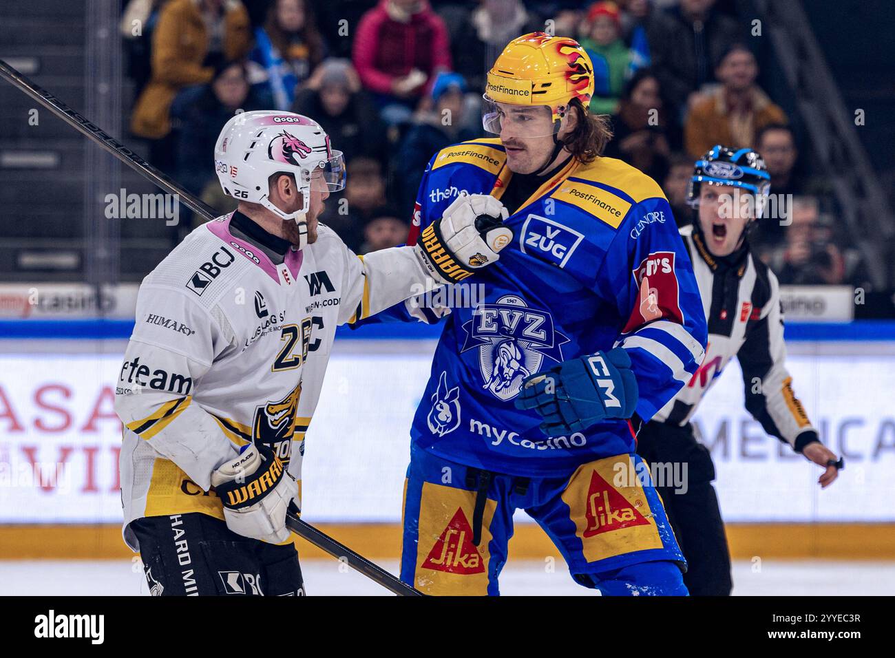 Kevin Fey #26 (HC Ajoie) grabs top scorer Daniel Vozenilek (EV Zug ...
