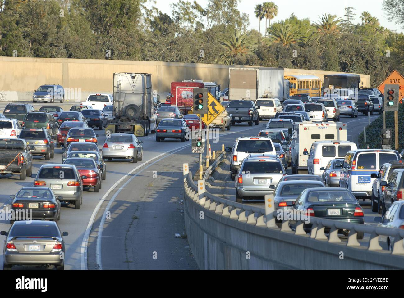 Evening rush hour in Los Angeles shows heavy traffic with cars, trucks ...