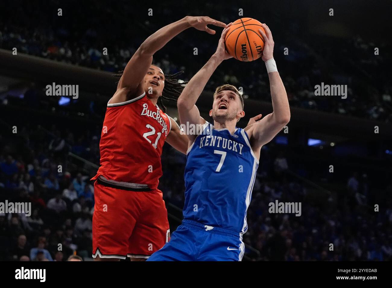 Ohio State's Devin Royal (21) defends Kentucky's Andrew Carr (7) during ...