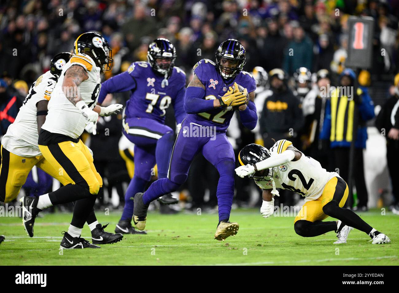 Baltimore Ravens running back Derrick Henry (22) runs with the ball ...