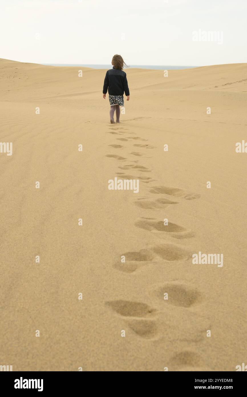 Lonely girl walking hi-res stock photography and images - Alamy